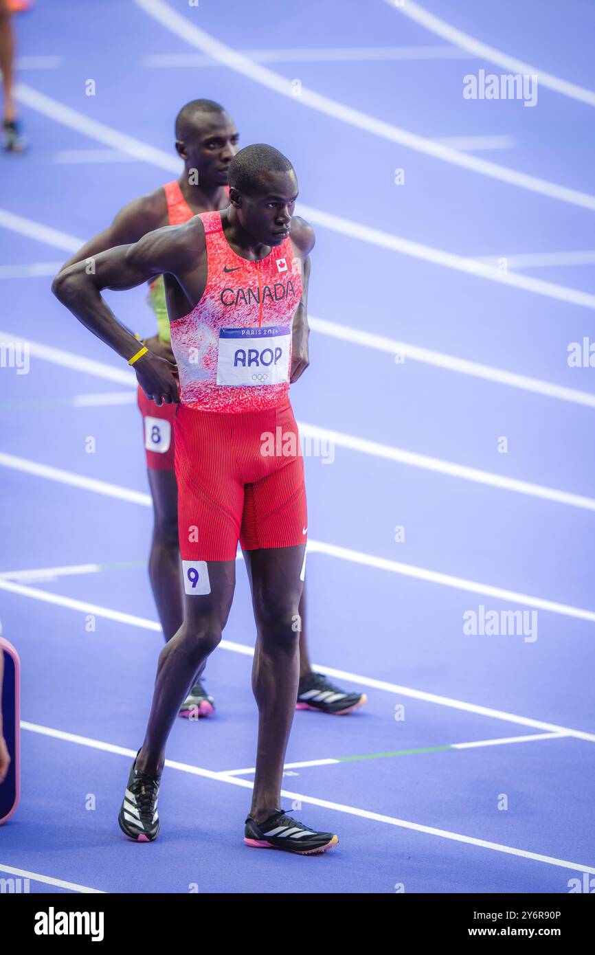 Marco Arop participating in the 800 meters at the Paris 2024 Olympic ...