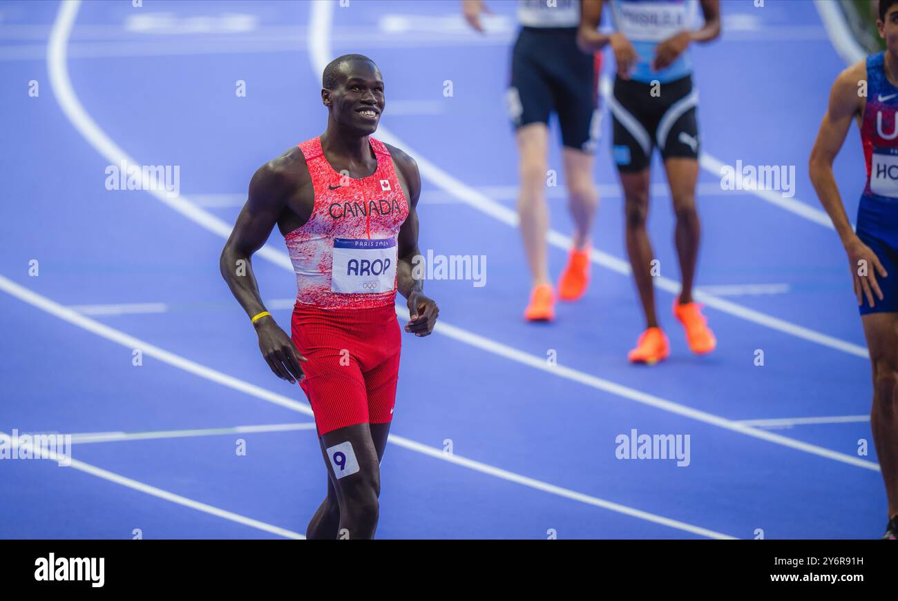 Marco Arop participating in the 800 meters at the Paris 2024 Olympic ...