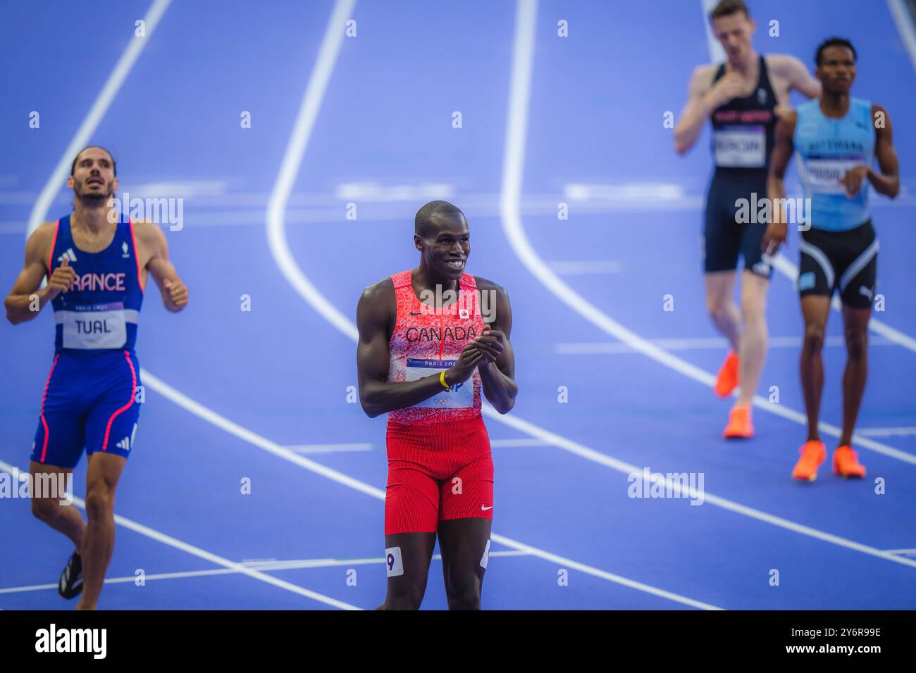 Marco Arop participating in the 800 meters at the Paris 2024 Olympic ...