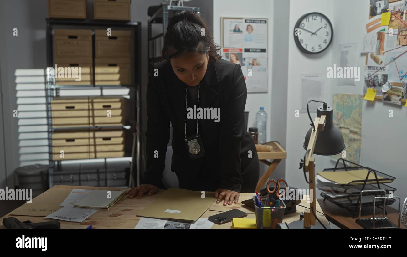 Hispanic detective analyzing evidence hi-res stock photography and ...