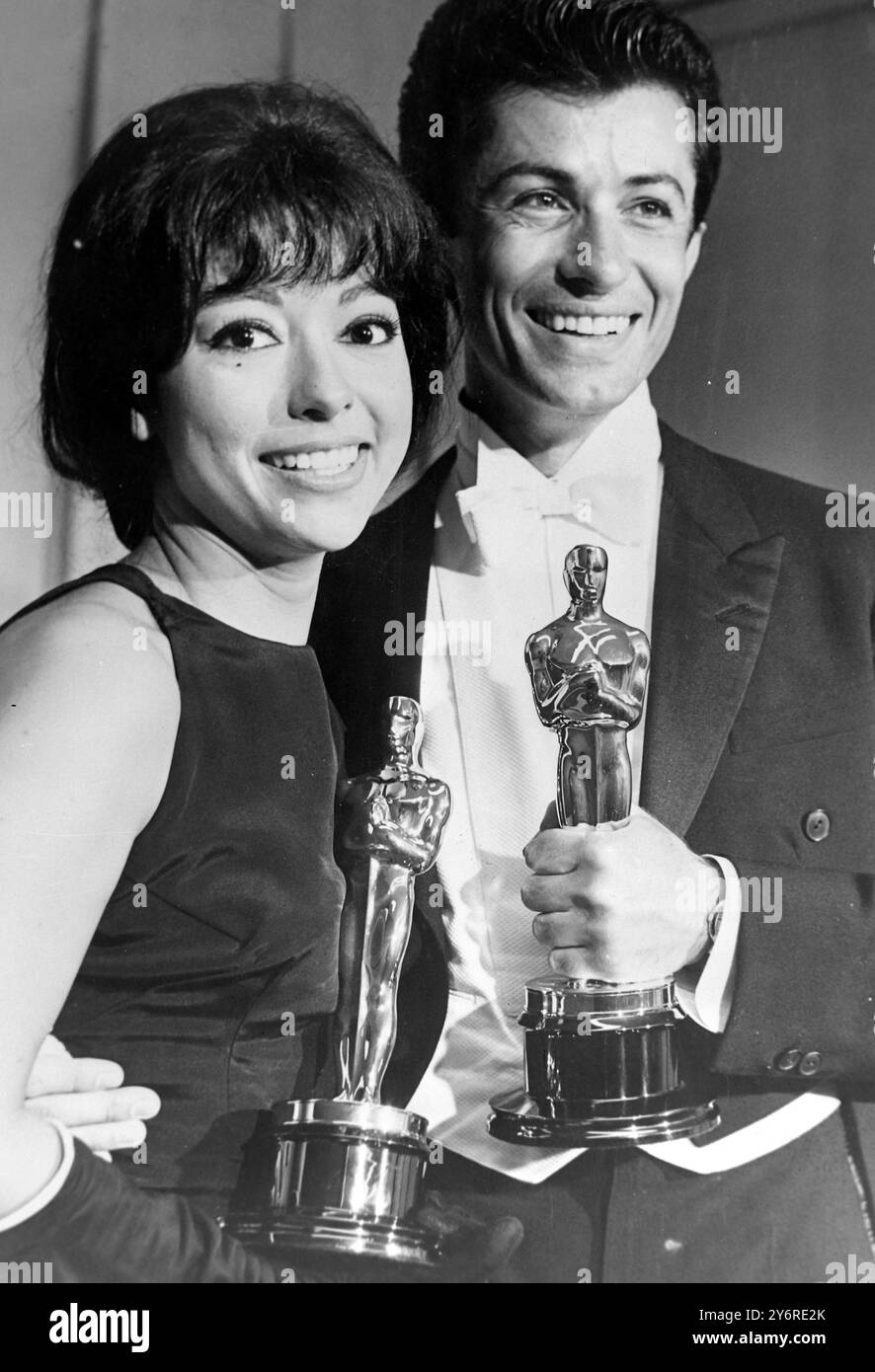 GEORGE CHAKIRIS WITH ACTRESS RITA MORENO HOLDING OSCARS ; 11 APRIL 1962 ...