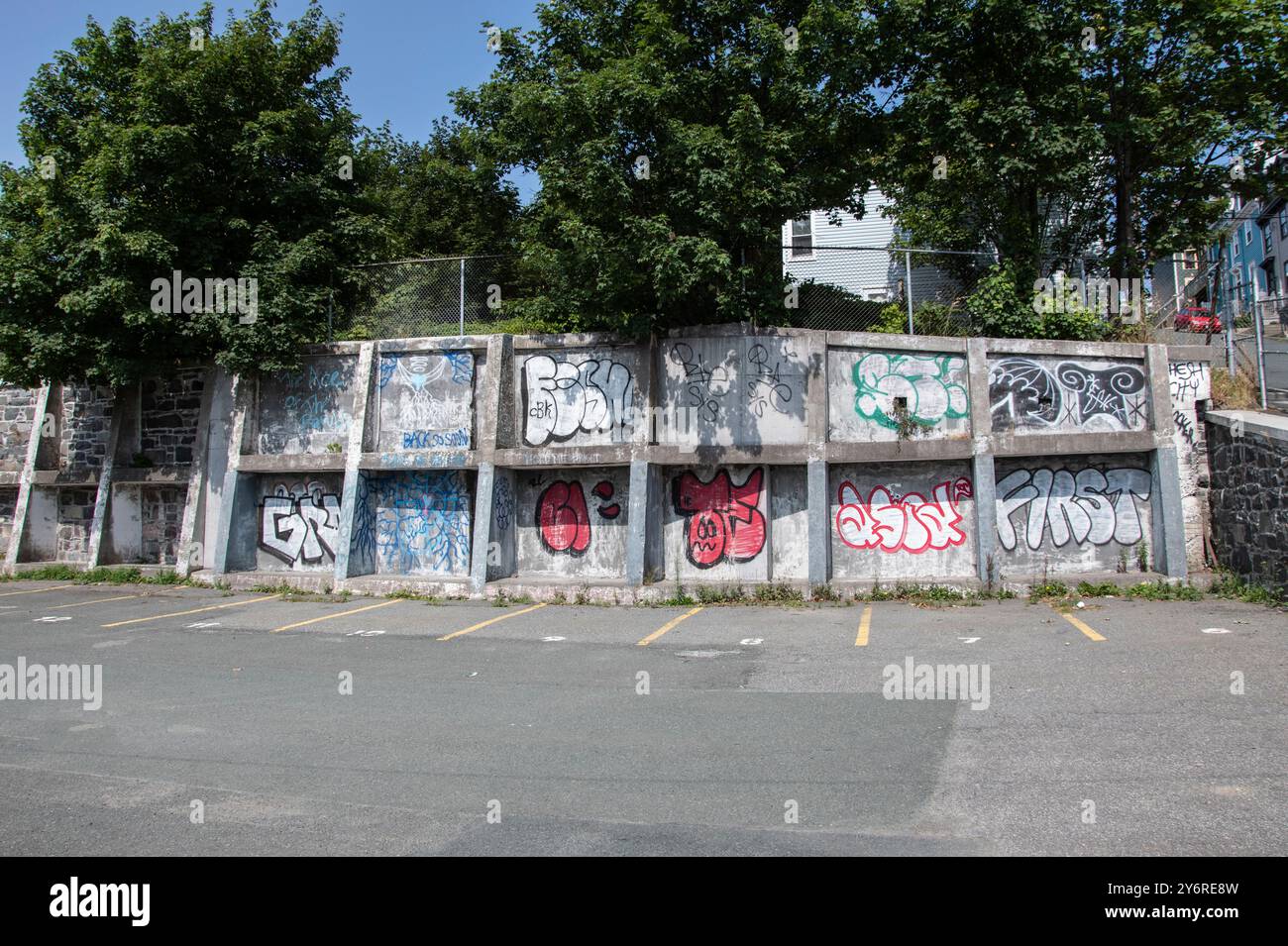 Graffiti tagged on a concrete retaining wall on Duckworth Street in ...