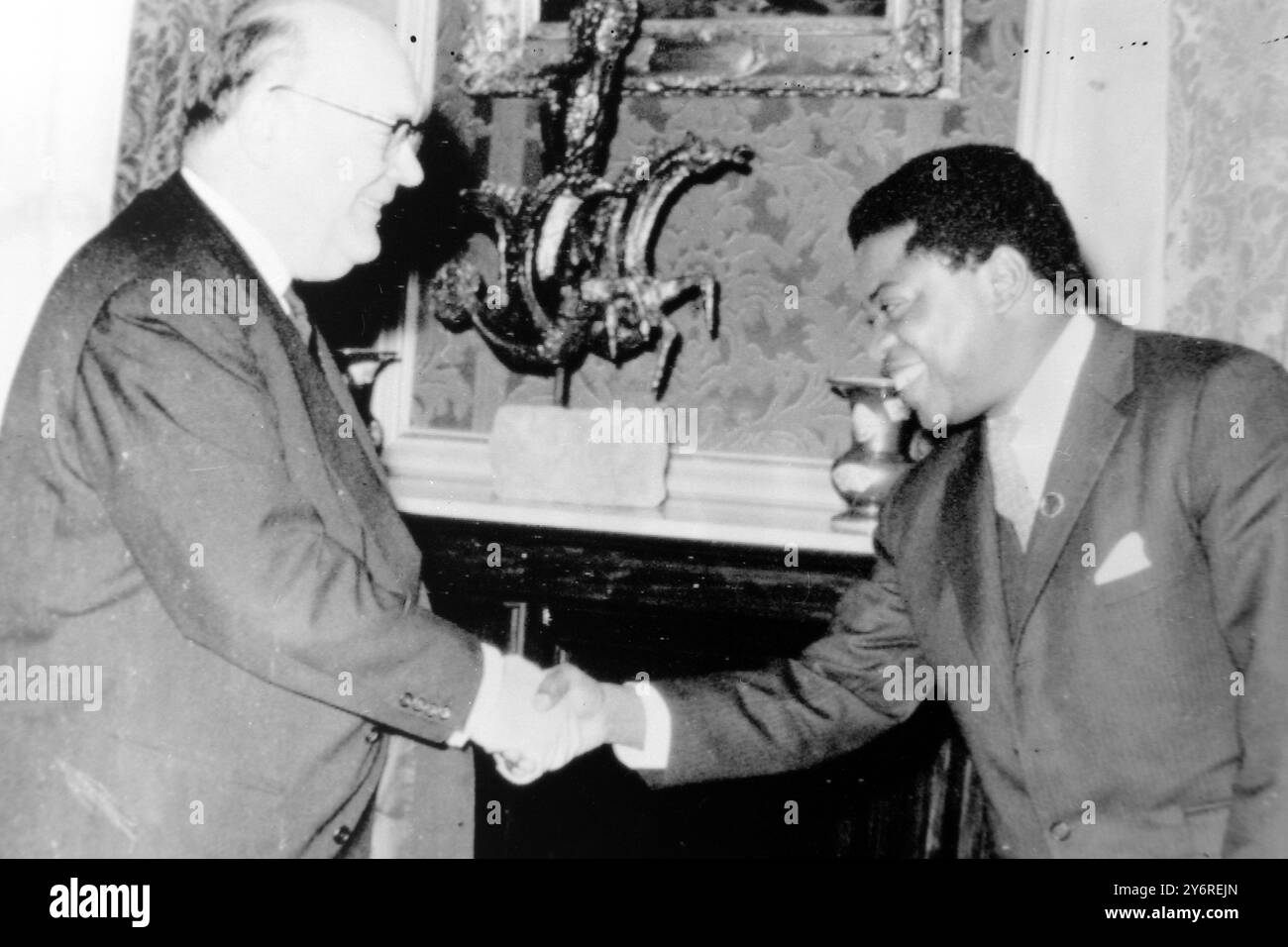 JUSTIN BOMBOKO WITH PAUL HENRI SPAAK IN BELGIUM / ; 9 APRIL 1962 Stock ...