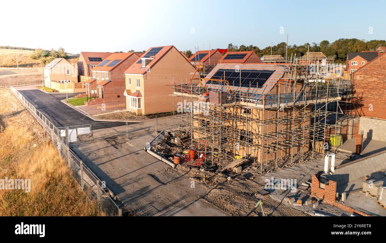 Aerial view of new build energy efficient and eco friendly homes with ...
