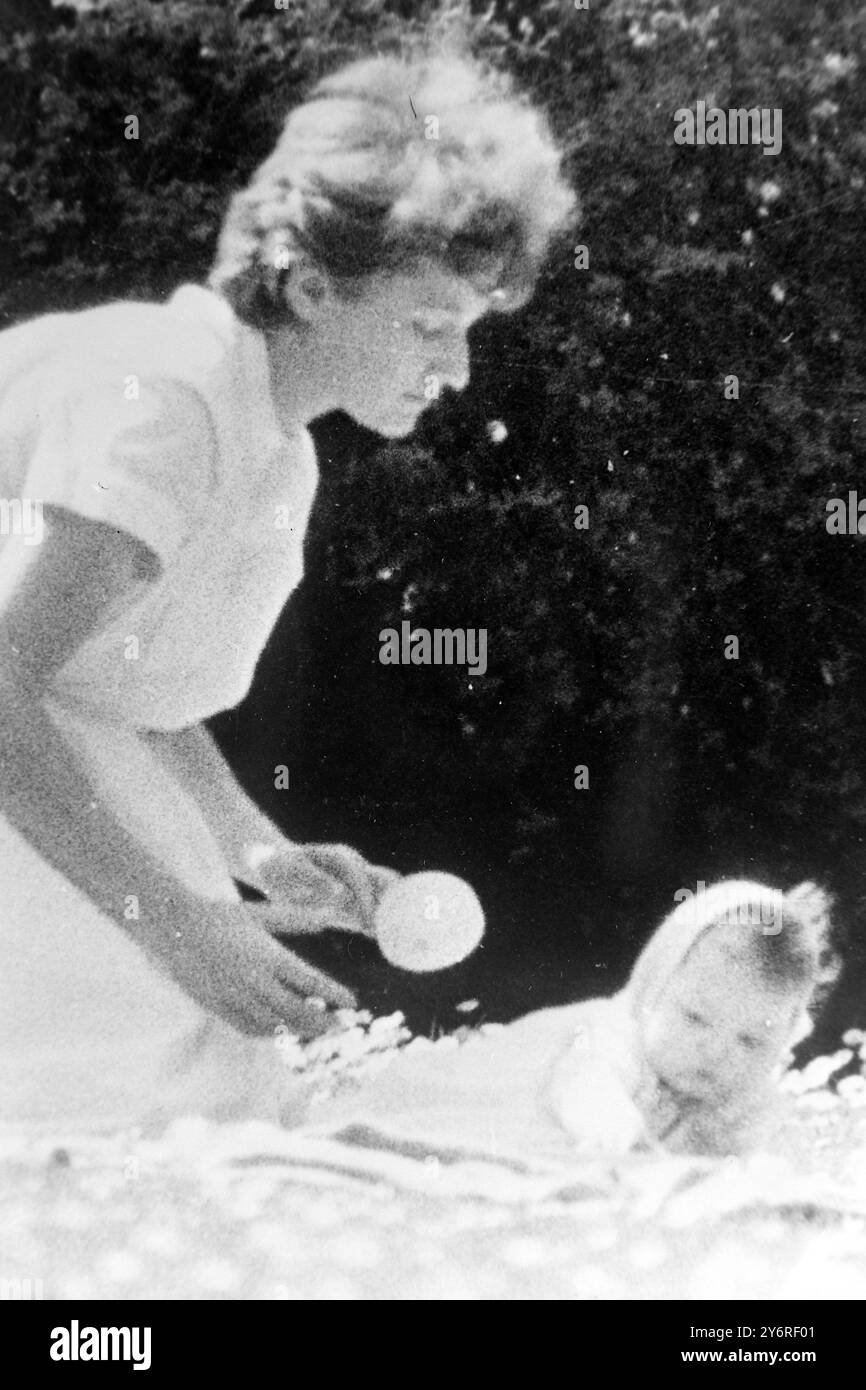 NURSE MARIA FISHER PLAYS WITH ELIZABETH TAYLORS' S ADOPTED CHILD IN ...