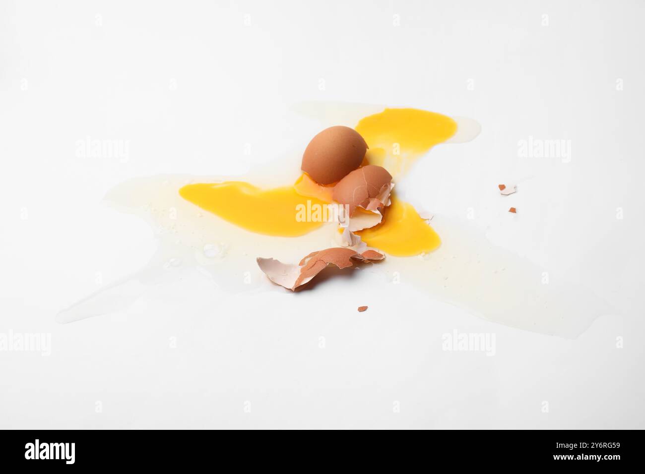 Raw broken egg on white background, top view Stock Photo - Alamy