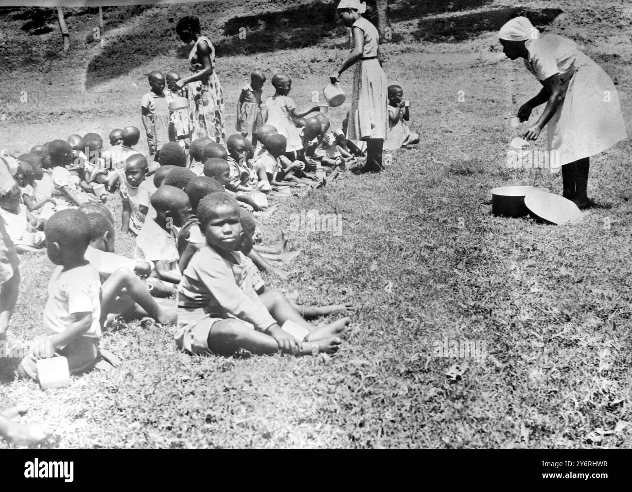 FAMINE MAN GIVES SUPPLY OF MILK TO STARVING CHILDREN IN KENYA 22 MARCH ...