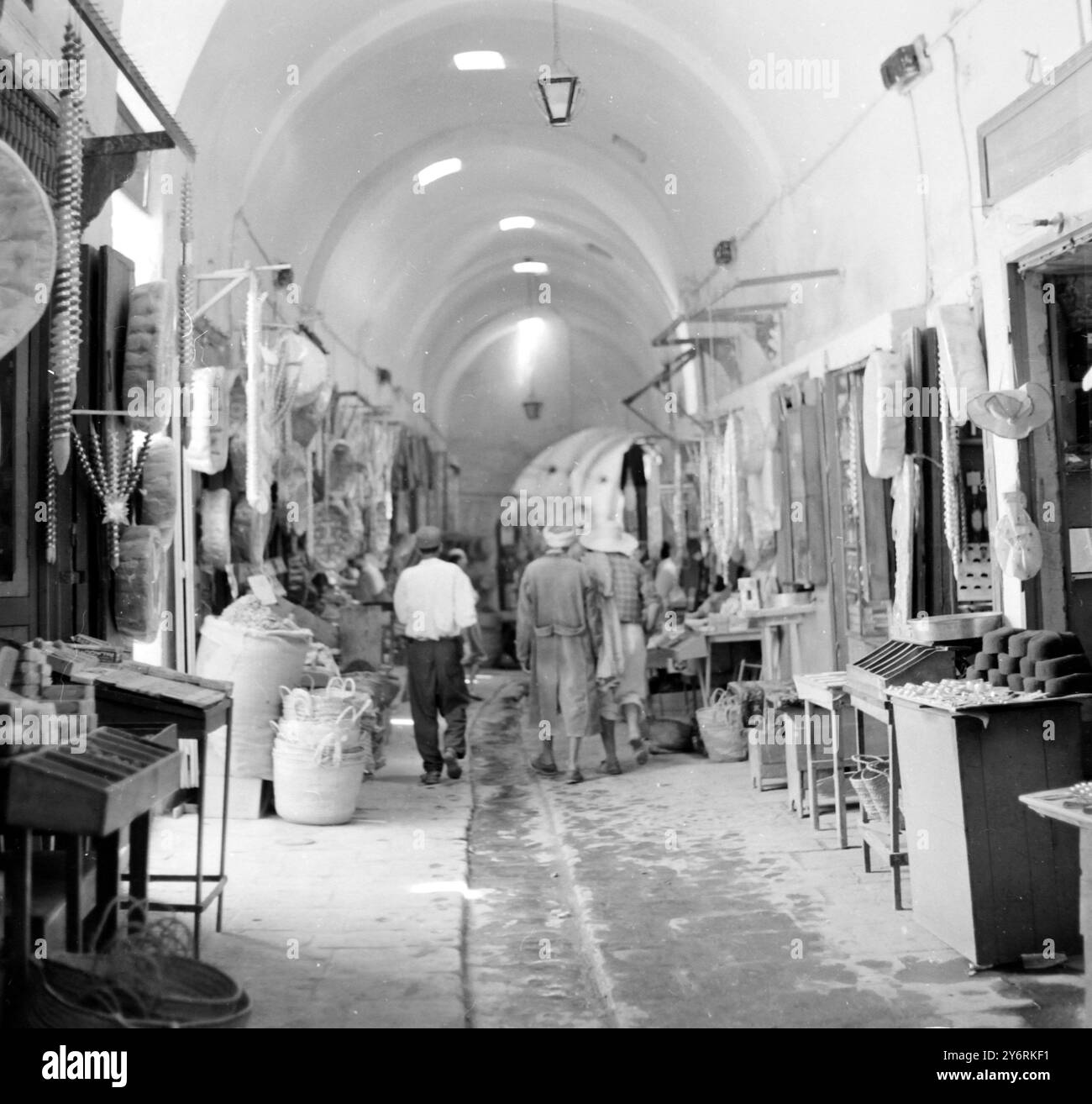 NATIVES ARCADE IN CASBAH TUNIS 12 MARCH 1962 Stock Photo - Alamy