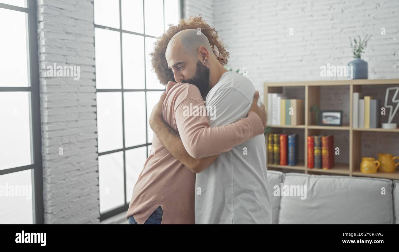 Two men embracing in a loving hug inside a cozy living room with modern ...