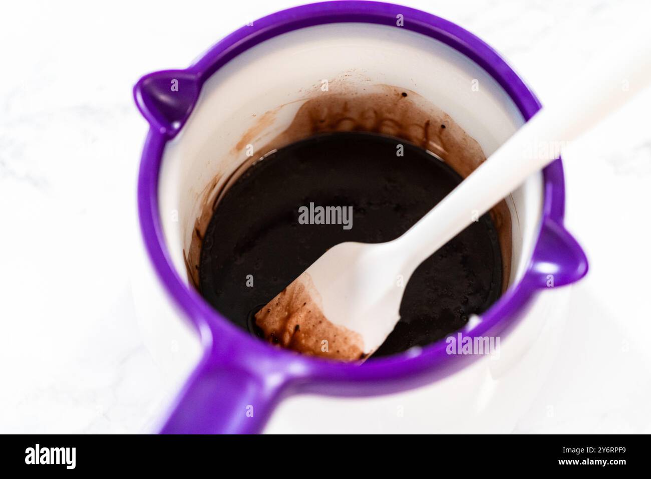 Cocoa Grease-Candy Melting Pot Bundt Prep Stock Photo - Alamy