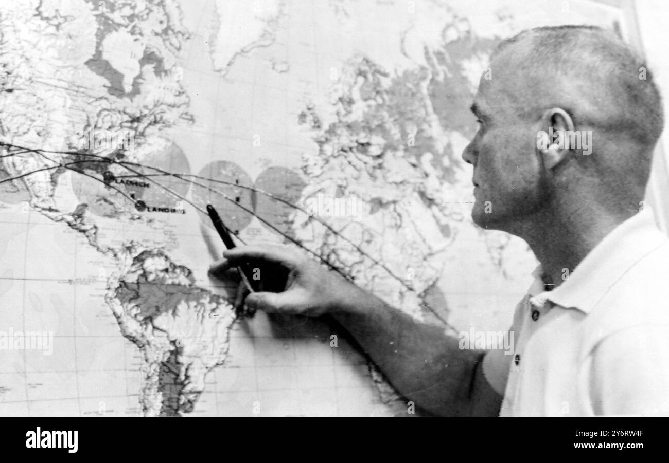 AMERICAN ASTRONAUT JOHN GLENN CHECKS RECOVERY AREAS ON MAP / 15 ...