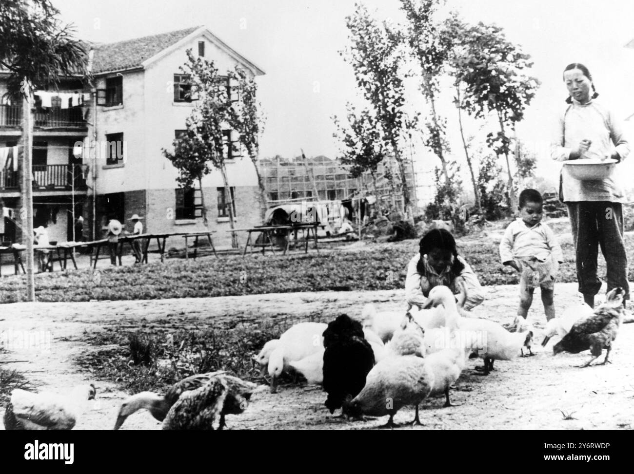 This photograph made in 1959 shows Chinese members of a people's ...