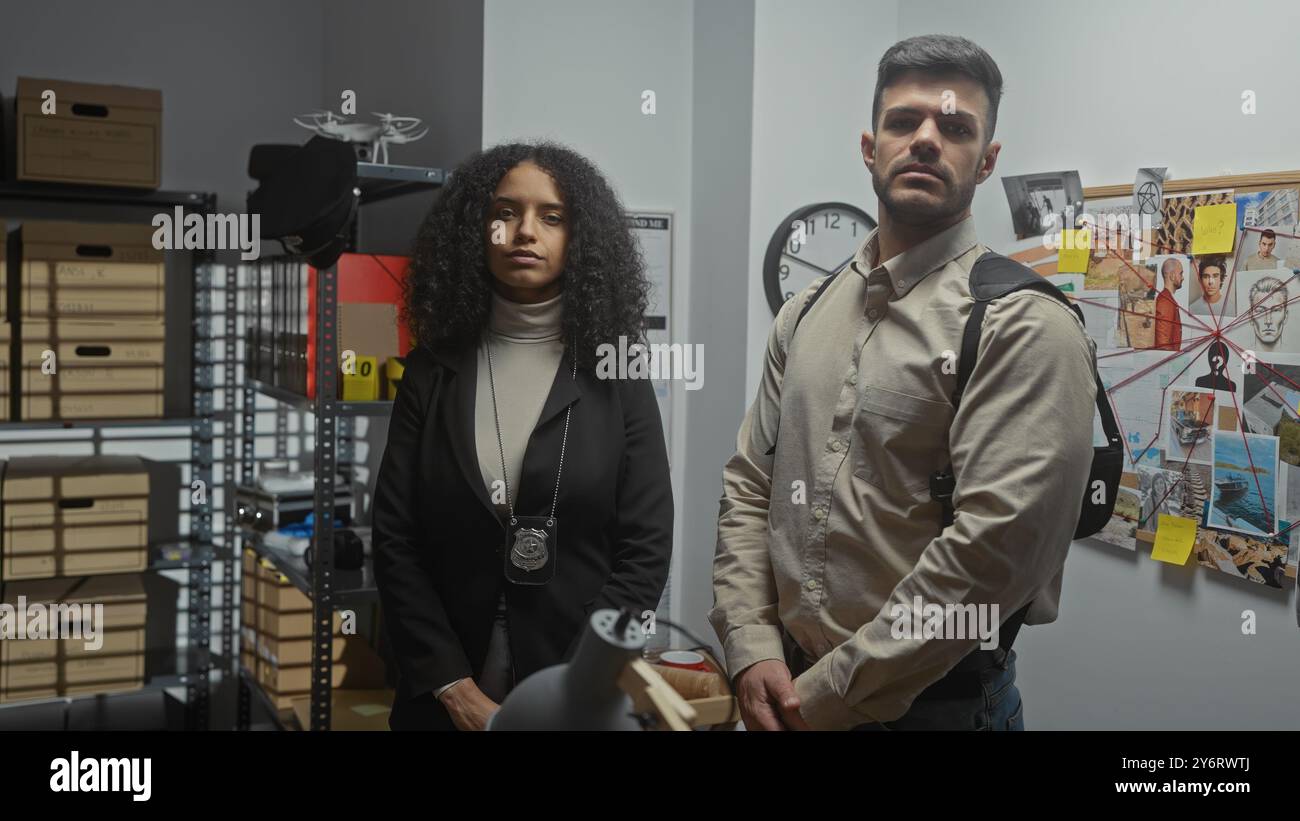 A serious man and woman in an office with a detective board, clock, and ...