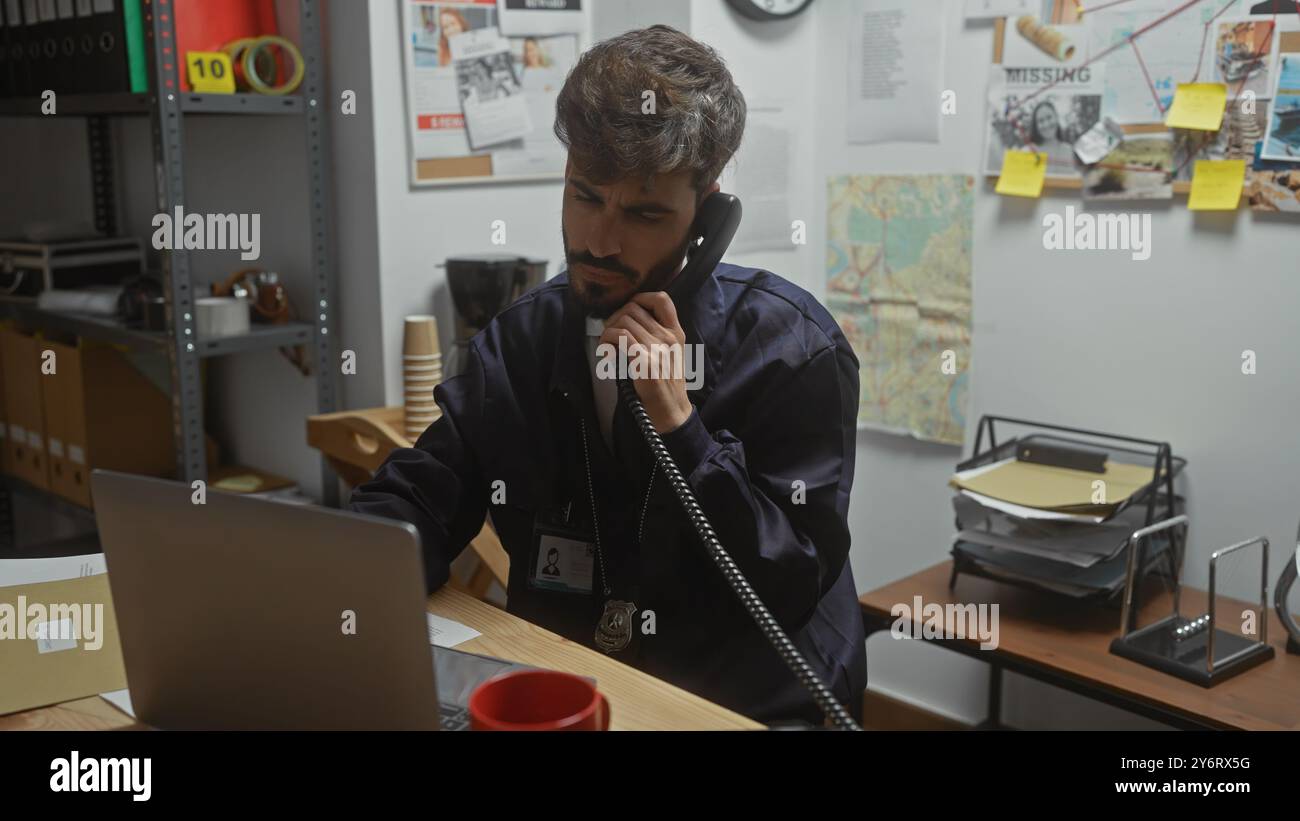 A focused hispanic man with a beard works as a detective in an office ...