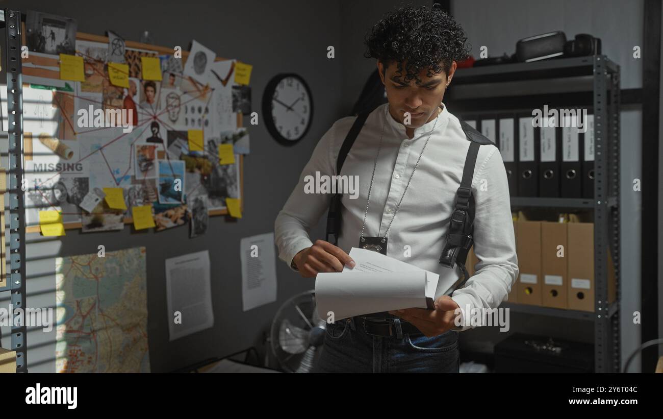 Hispanic detective analyzes documents hi-res stock photography and ...