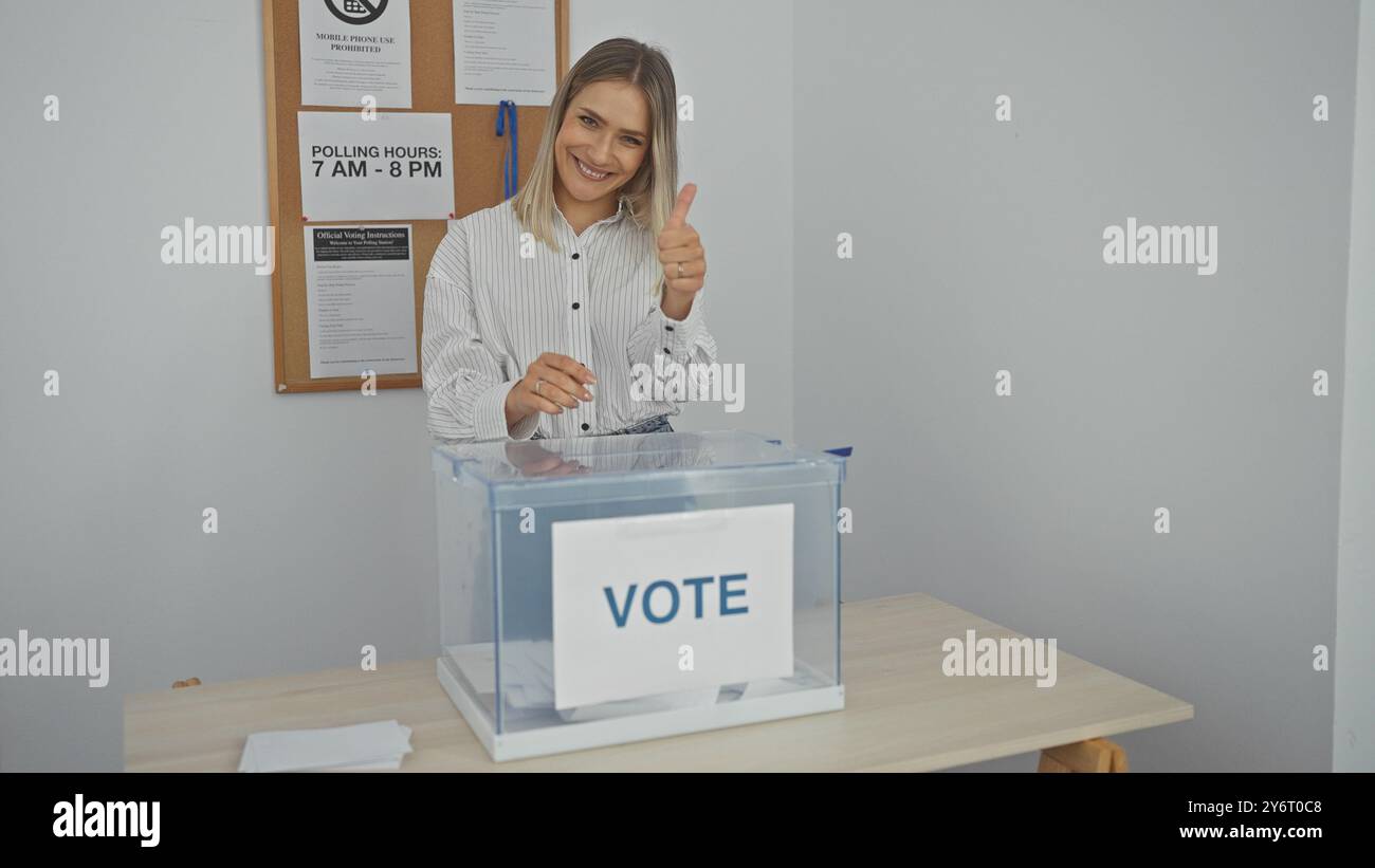 A young caucasian woman voting in an electoral college room, giving a ...