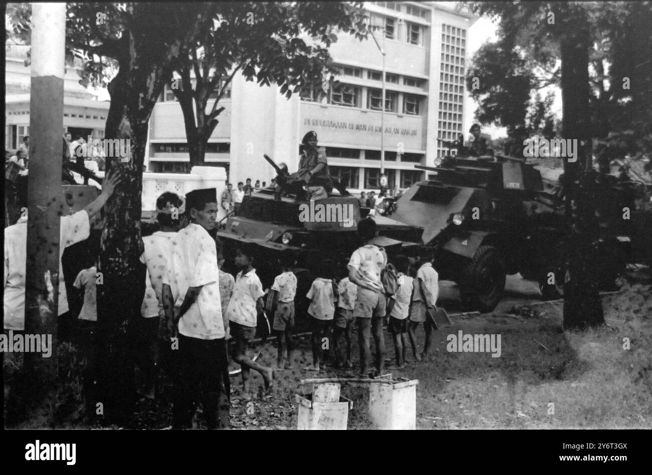 ARMY CHILDREN WATCH ARMOURED CARS DJAKARTA 18 JANUARY 1962 Stock Photo ...