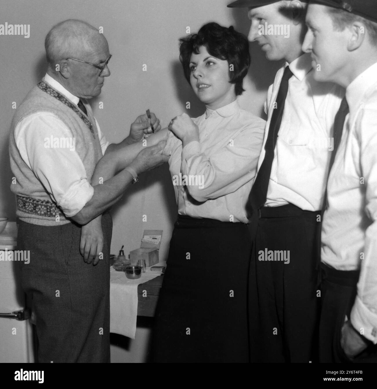 14 JANUARY 1962 A STEWARDESS AND STAFF FROM BRITISH EUROPEAN AIRWAYS ...