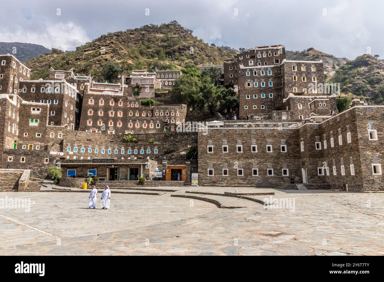 RIJAL ALMA, SAUDI ARABIA - NOVEMBER 20, 2021: Local men in ancient ...