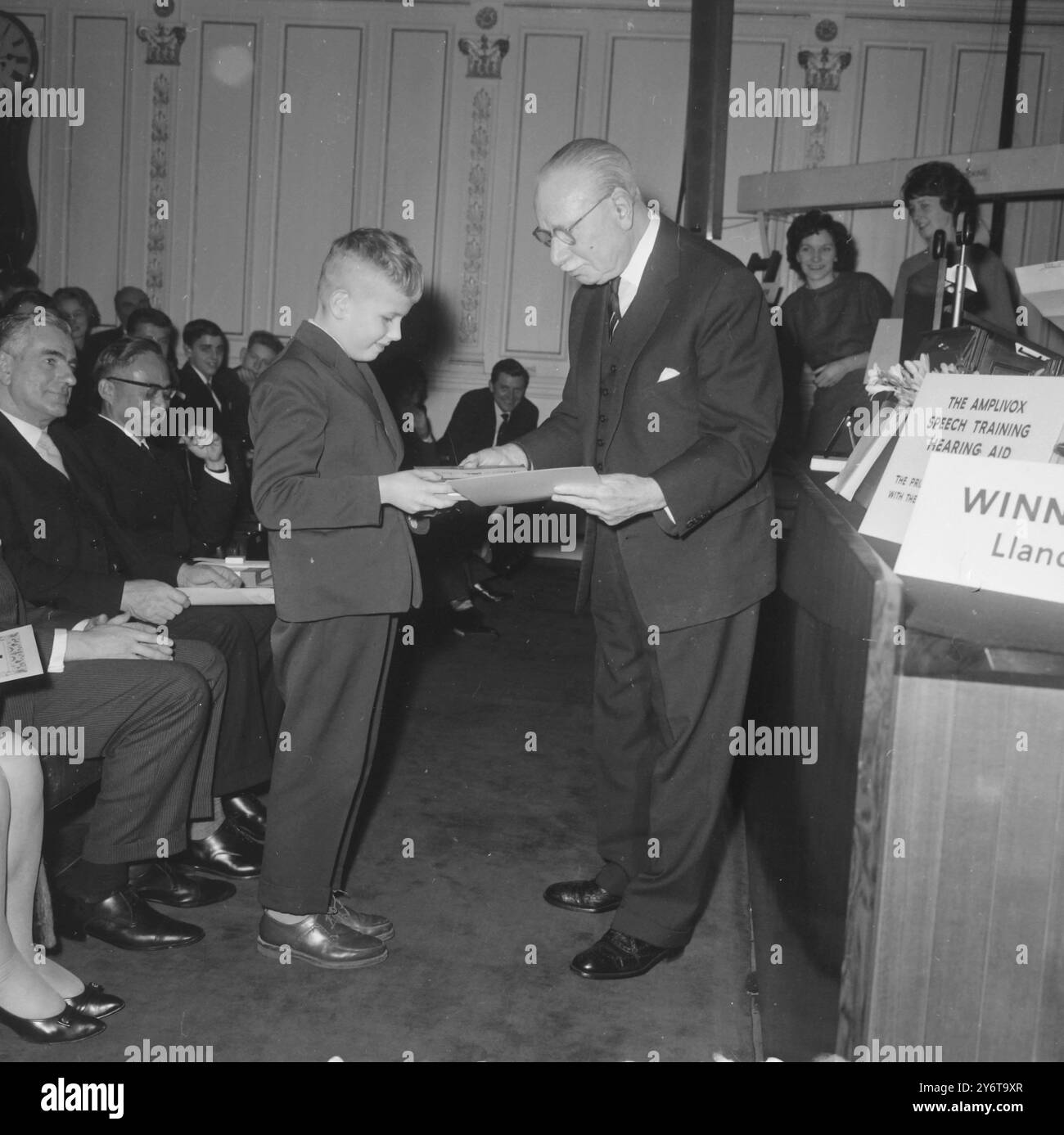 LORD BOSSOM PRESENTING TO DEAF BOY KAARIO BASKEN WITH PRIZE FOR BEST ...