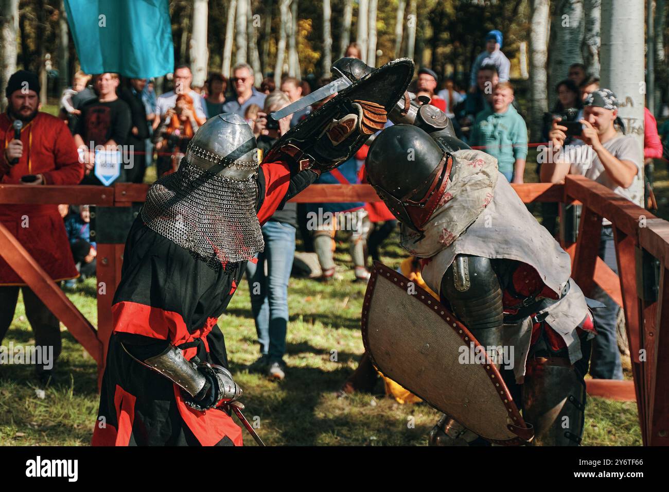 Battle of knights in armor and helmets on swords Stock Photo - Alamy
