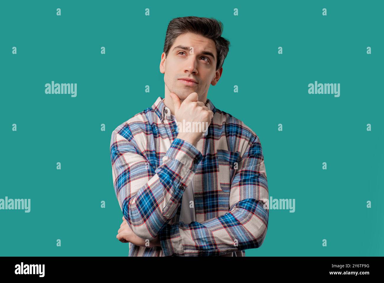 Thinking around man on blue background. Smart student 30s guy searching ...