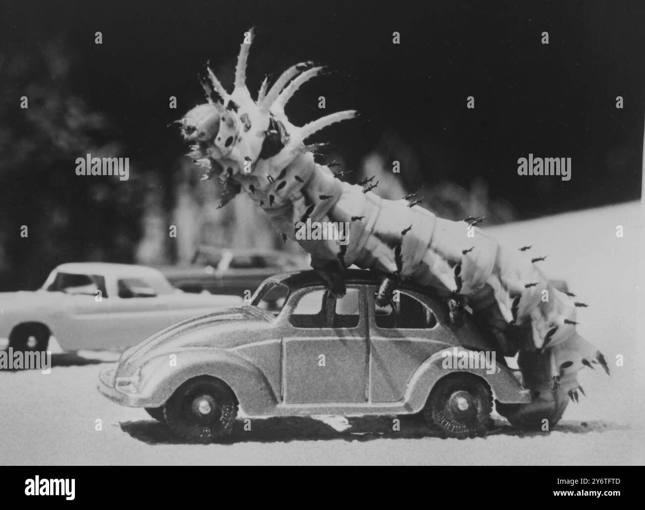 INSECT CATERPILLAR DRIVING CAR 6 NOVEMBER 1961 Stock Photo - Alamy