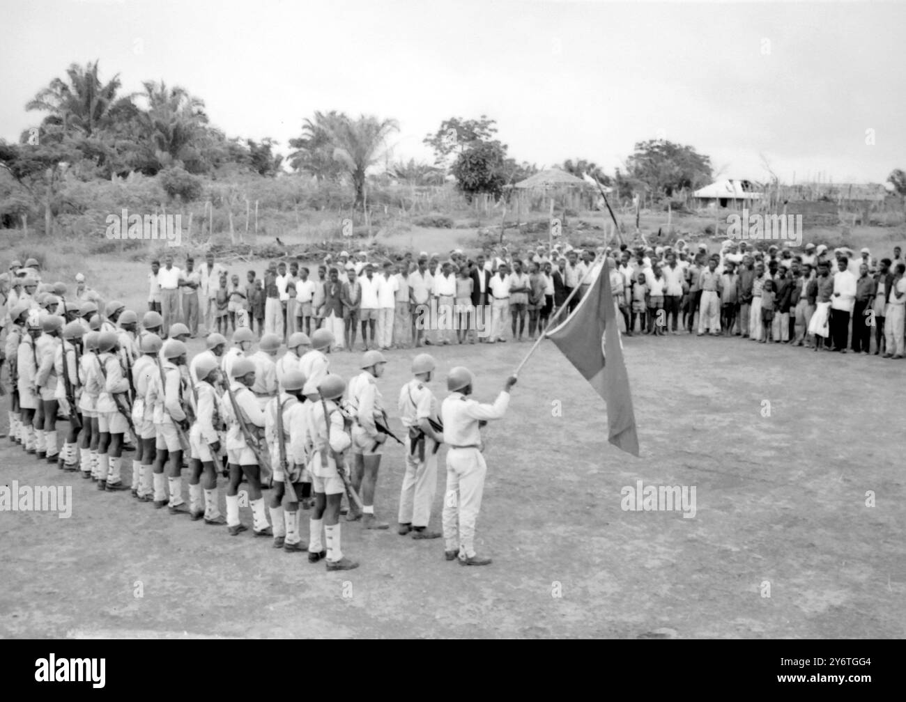 NATIVES NATIVES LINE UP BEFORE PORTUGUESE SOLDIERS IN NORTHERN ANGOLA 1 ...