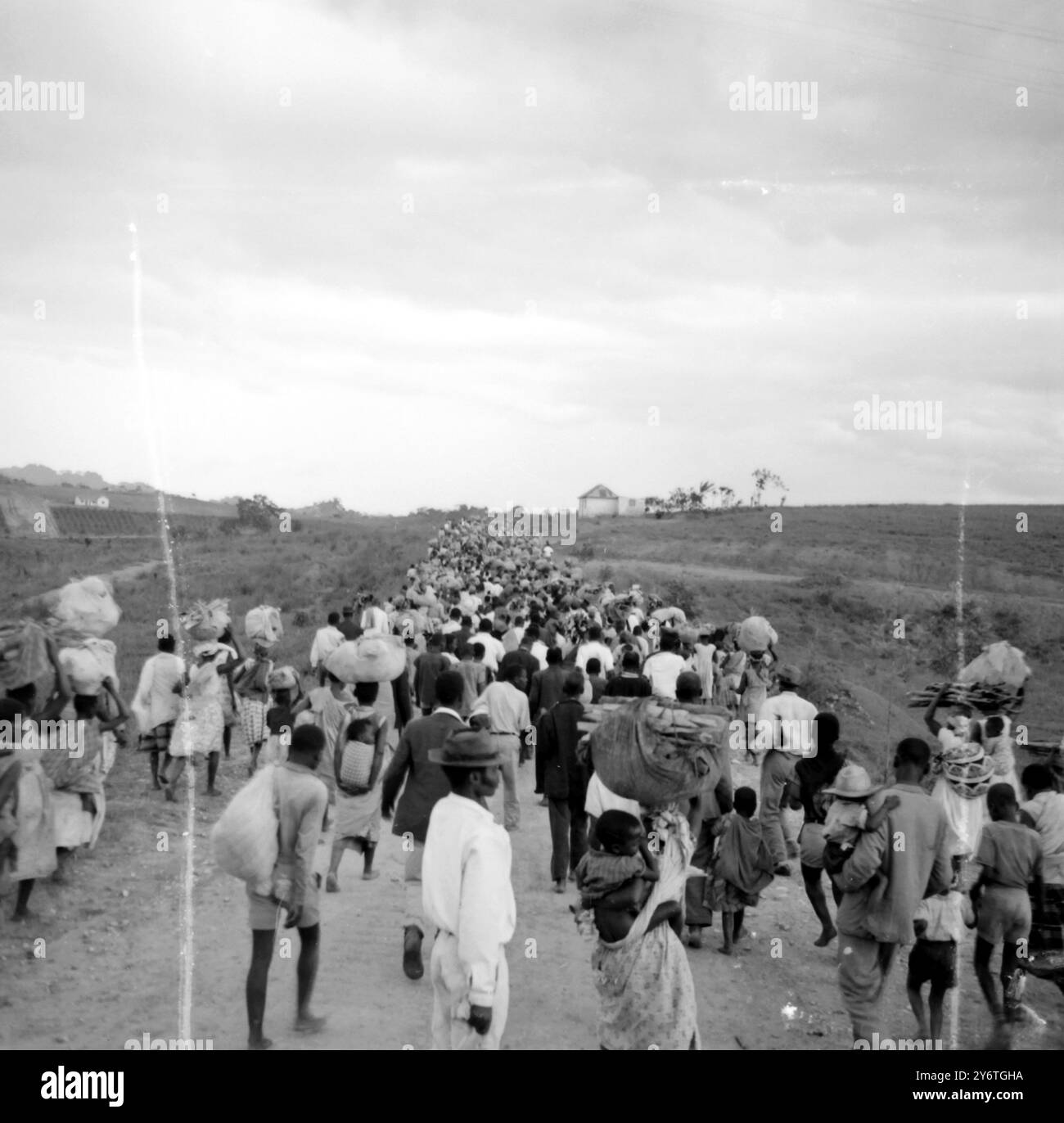 NATIVES NATIVE CARRYING THEIR LUGGAGE RETURN FROM THE JUNGLE IN ...