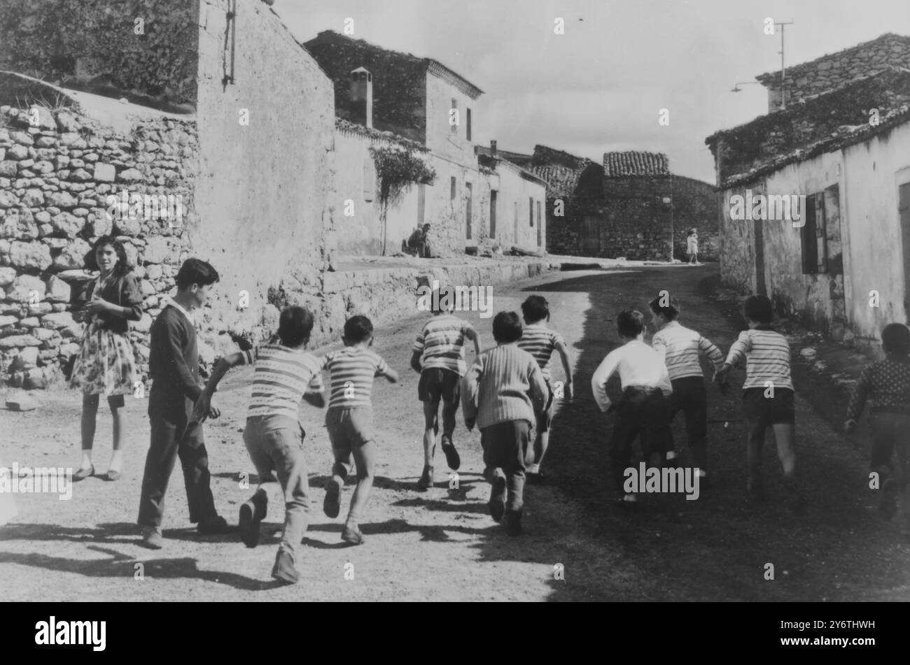 SARDINIA CHILDREN PLAYING IN STREET 24 OCTOBER 1961 Stock Photo - Alamy