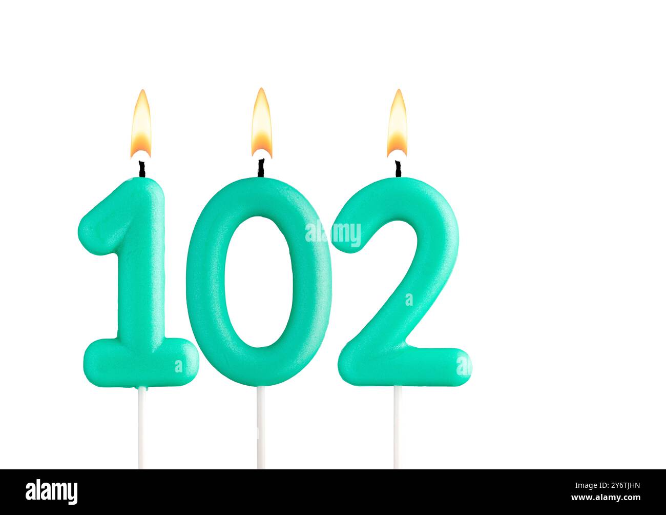 Birthday number 102 - Green birthday candle on white background Stock ...