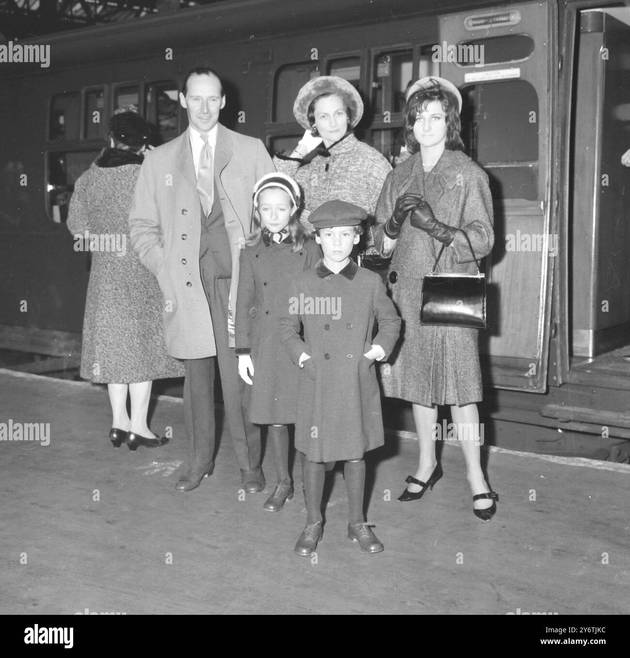 DAVID ORMSBY GORE WITH FAMILY AT WATERLOO STATION IN LONDON 18 OCTOBER ...