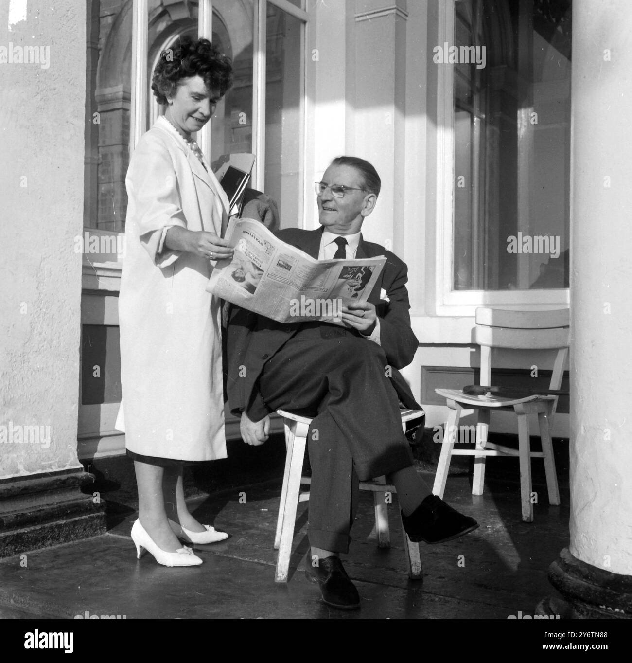 MORGAN PHILLIPS ON A BALCONY - RELAXES / 2 OCTOBER 1961 Stock Photo - Alamy