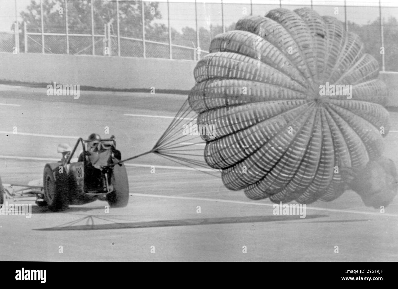 DRAGSTER DRIVER CHRIS KARAMESINES CH DRAG RACING USING PARACHUTE / 18 ...
