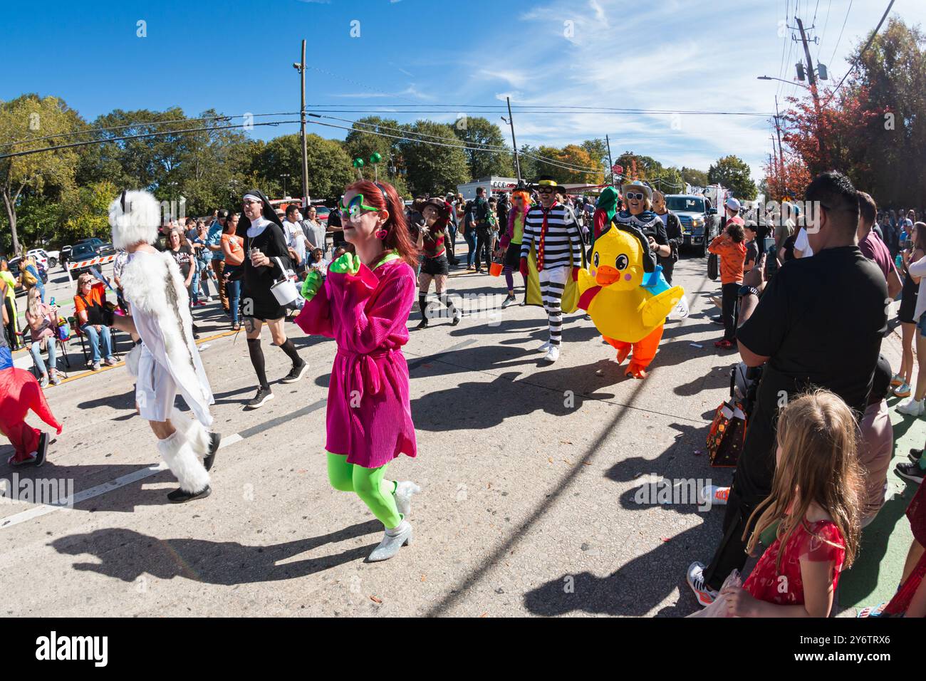 Atlanta, GA / USA - October 22, 2023: Adults wearing various costumes ...