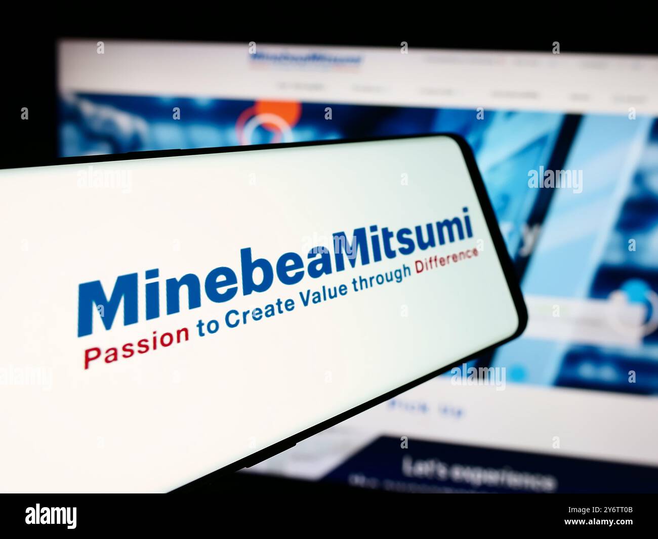 In this photo illustration, a cellphone with the logo of Japanese electronics company ...