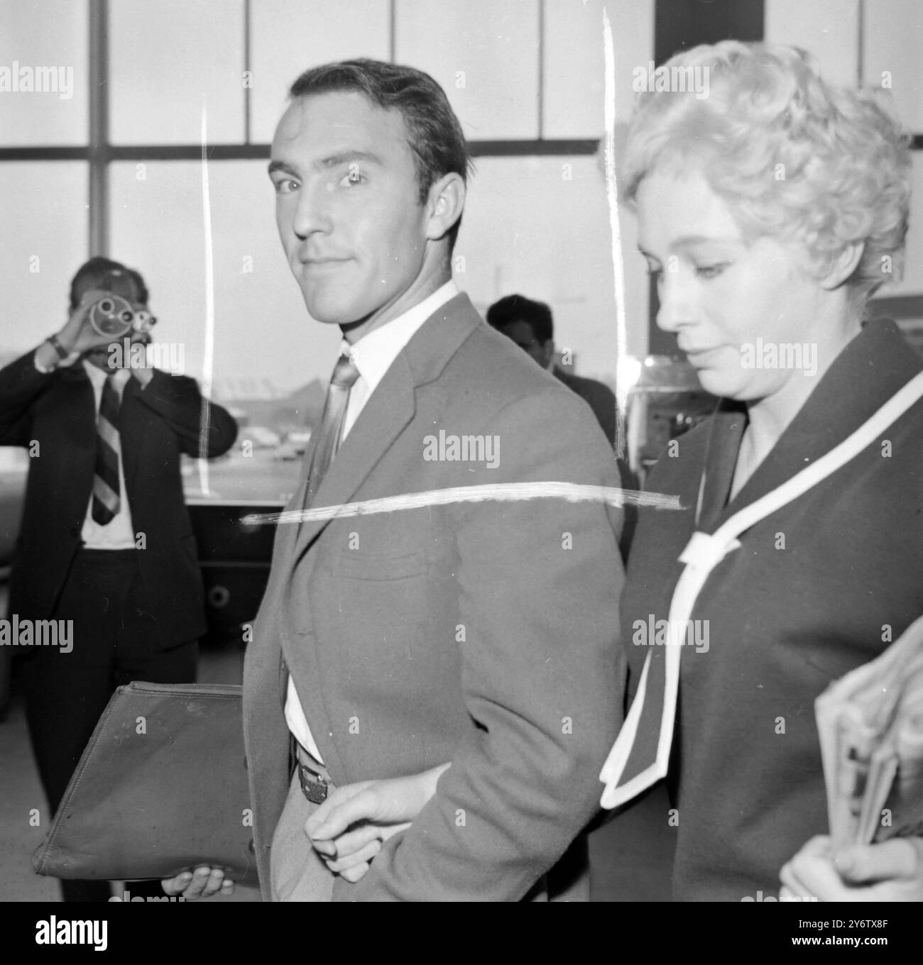 FOOTBALLER JIMMY GREAVES WITH WIFE IRENE AT LONDON AIRPORT 25 AUGUST ...