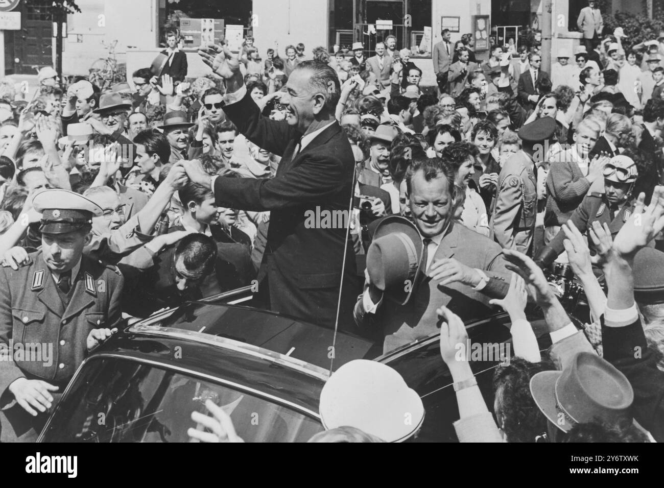 LYNDON JOHNSON AND THE MAYOR OF WEST BERLIN WILLY BRANDT IN BERLIN WITH CROWDS 20 AUGUST 1961 ...