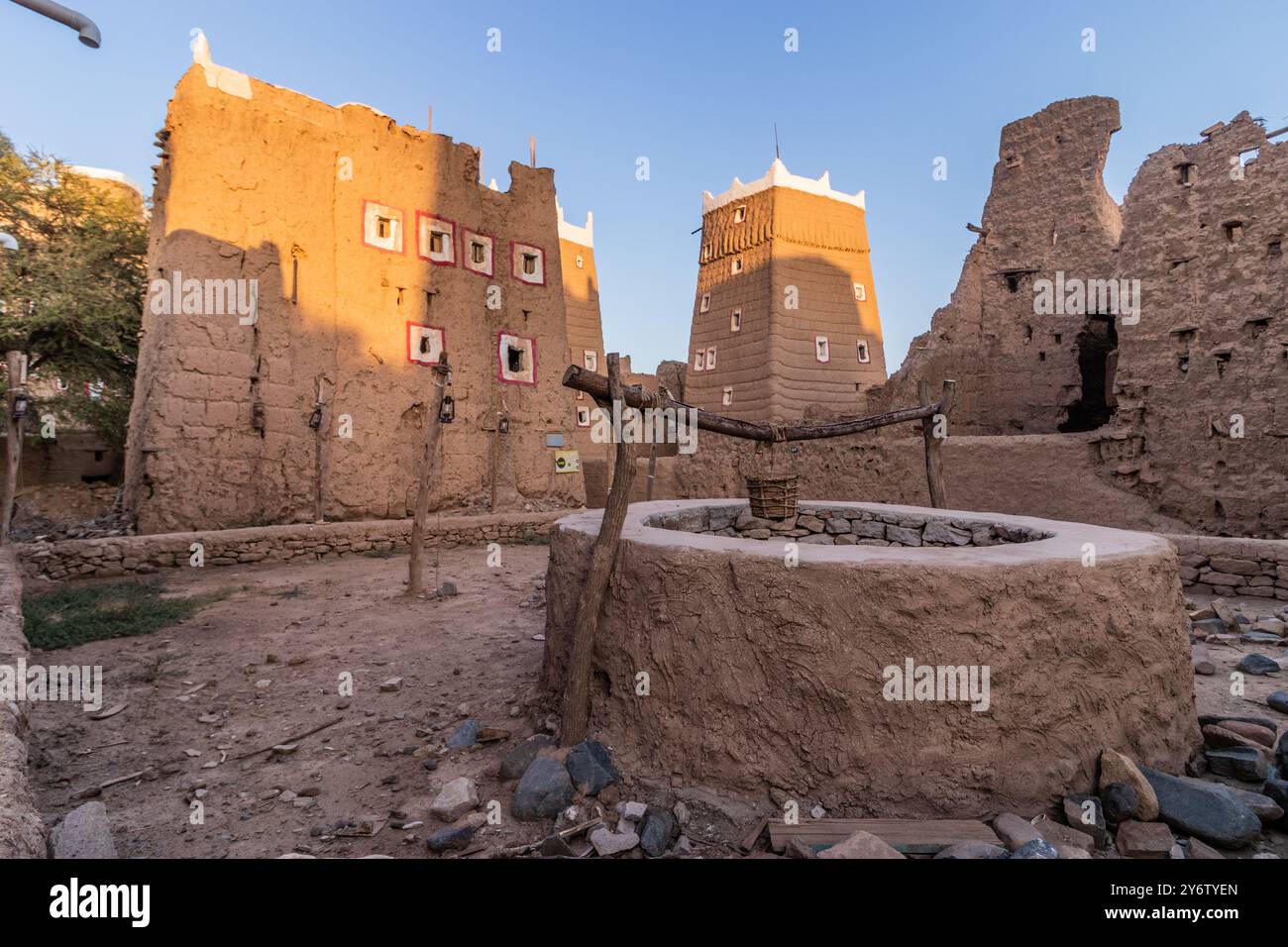 Old well and mud-brick houses in Dhahran al Janub, Saudi Arabia Stock ...