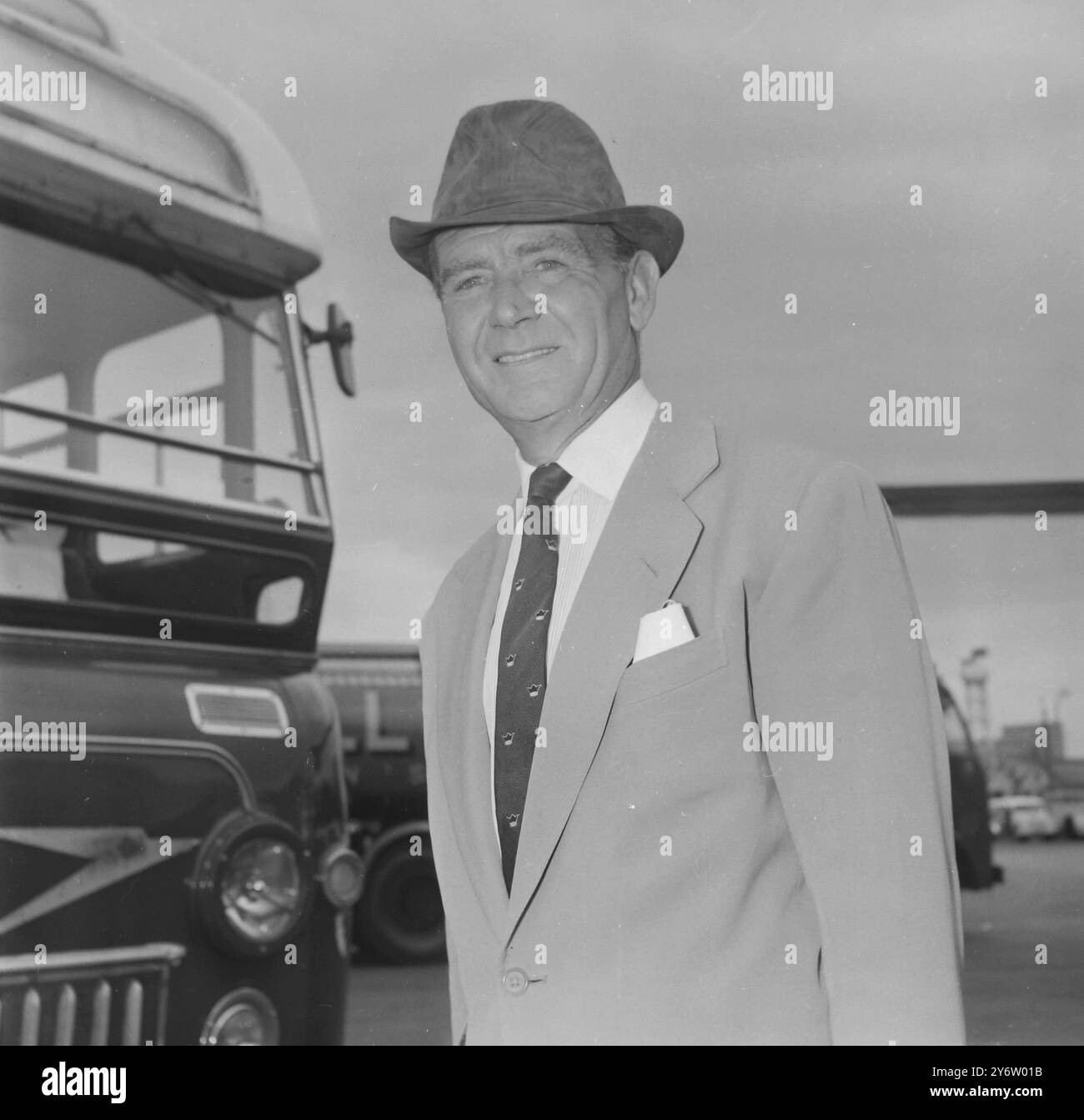 BRITISH ACTOR JOHN MILLS AT LONDON AIRPORT ENROUTE LOS ANGELES / 10 ...