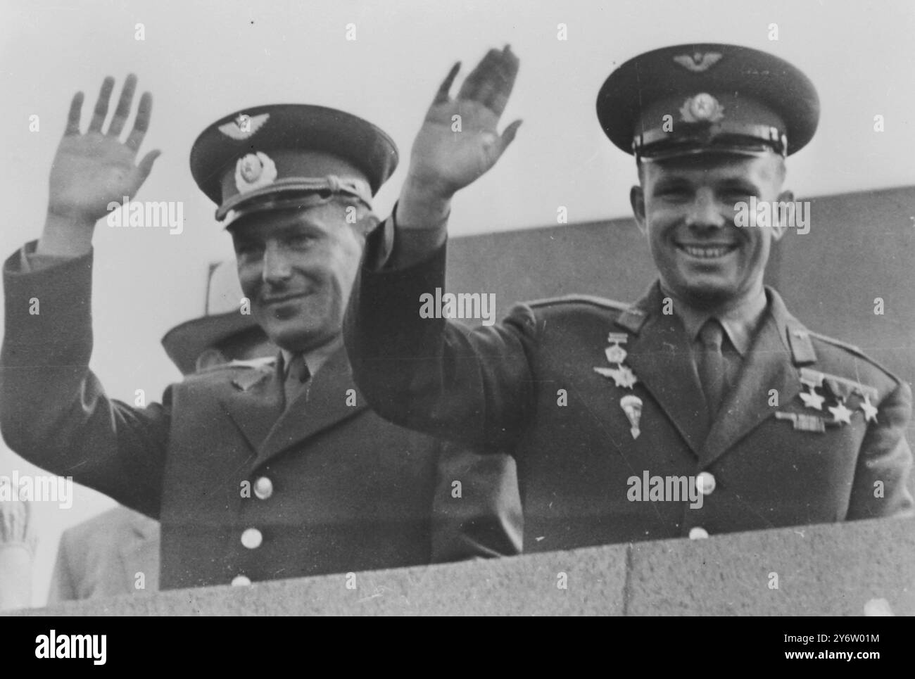 RUSSIAN COSMONAUTS MAJORS YURI GAGARIN AND GHERMAN TITOV WAVE TO CROWS ...
