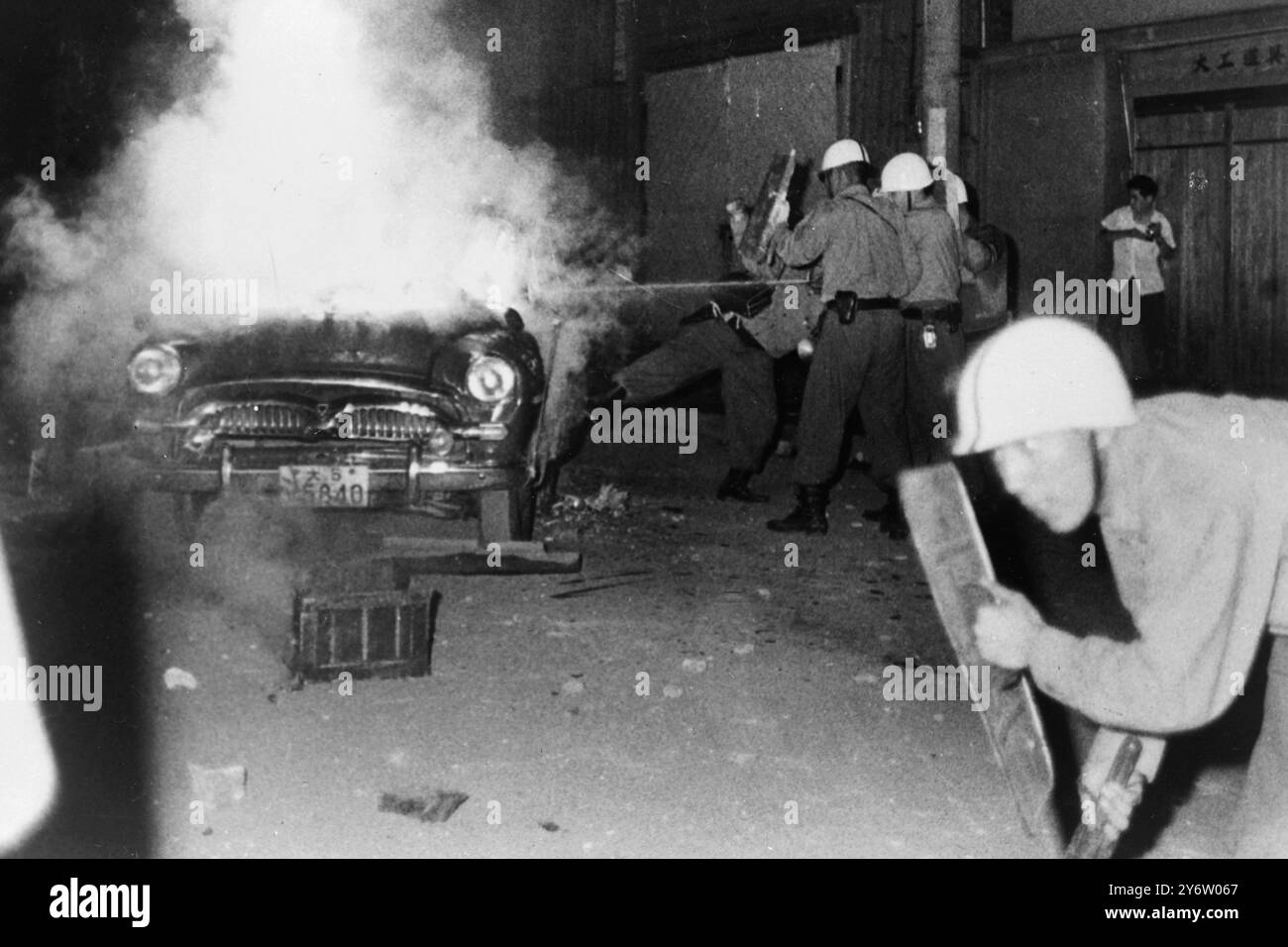 Anti police riots in Black and White Stock Photos & Images - Alamy