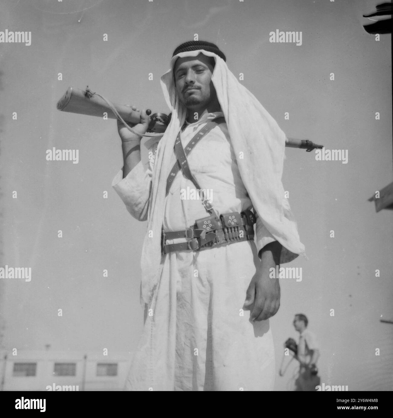 BEDOUIN TRIBESMEN WITH NEW RIFLE LEAVES POLICE STATION IN KUWAIT 5 JULY ...