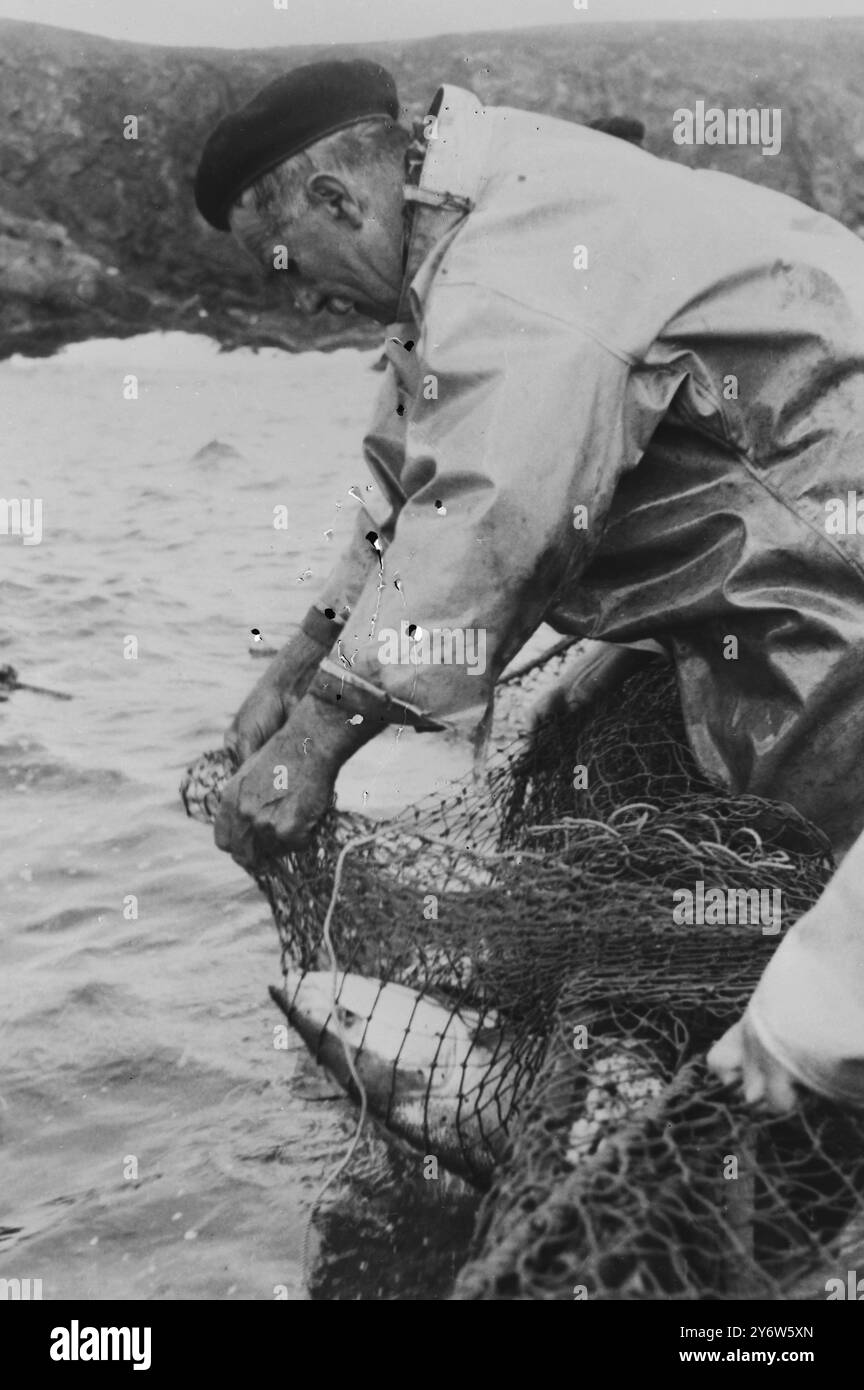 Haul in the nets Black and White Stock Photos & Images - Alamy