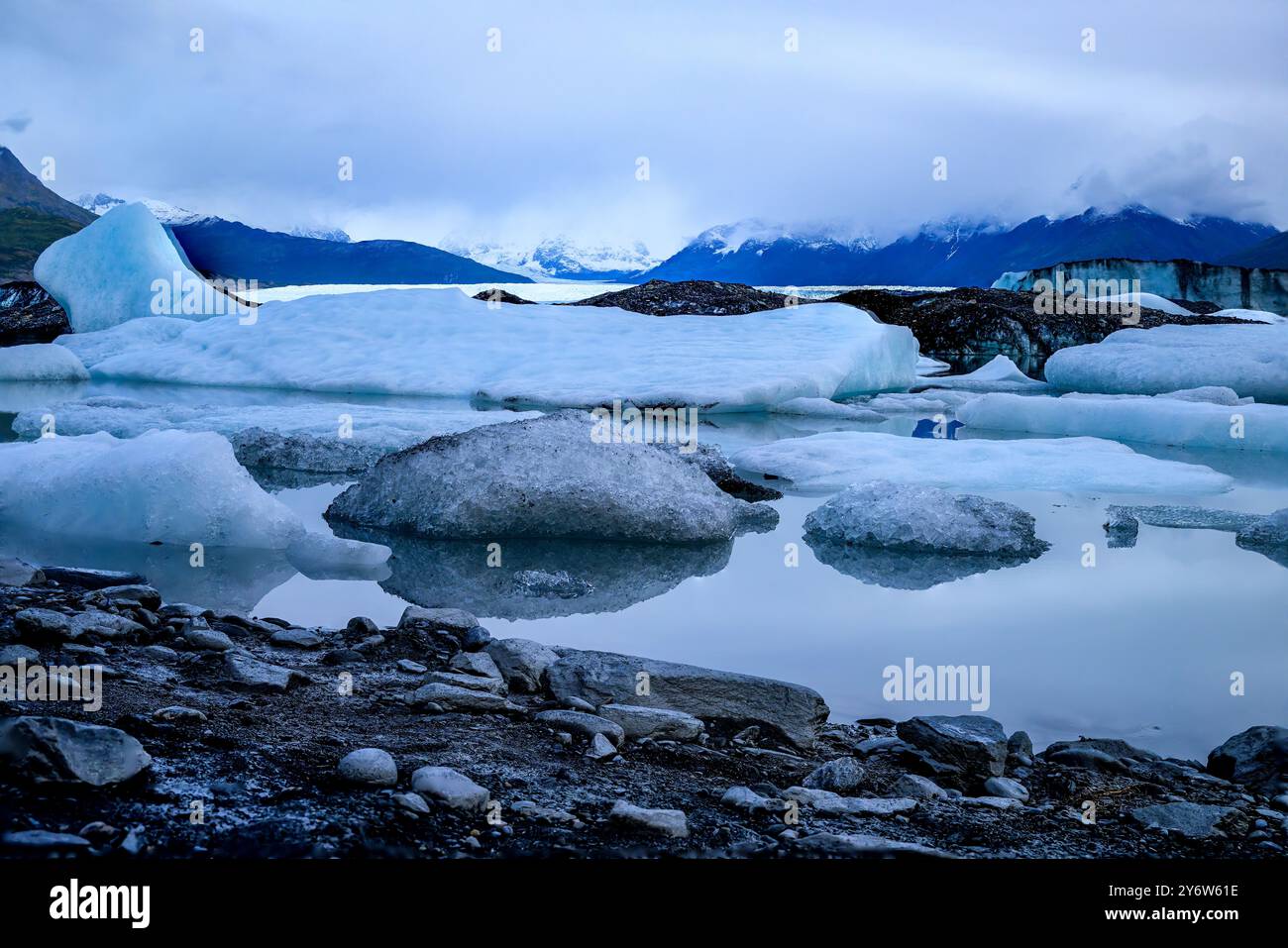 Reflections of the floating ice flows in the mirror like Knik River ...