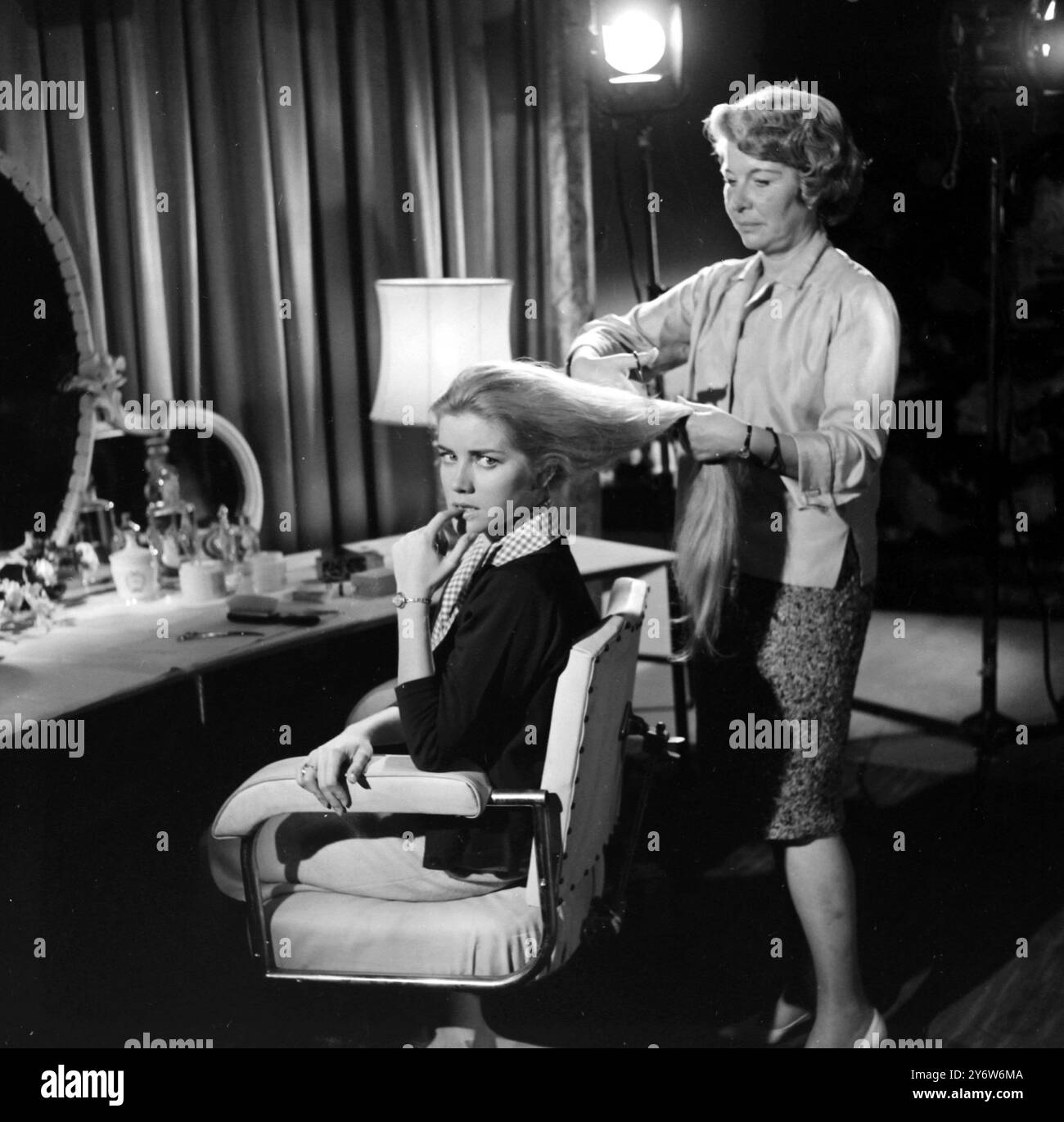 ACTRESS DOLORES HART DOING HER MAKE-UP ON THE FILMSET THE INSPECTOR ...