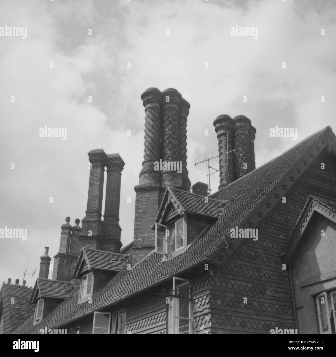 House with chimneys hi-res stock photography and images - Alamy