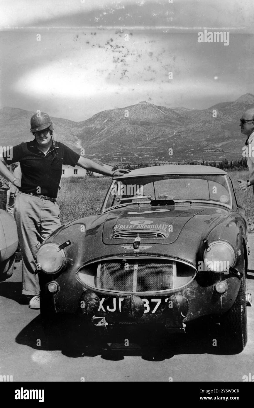 MOTOR RALLY RILEY POSES WITH CAR 23 MAY 1961 Stock Photo - Alamy