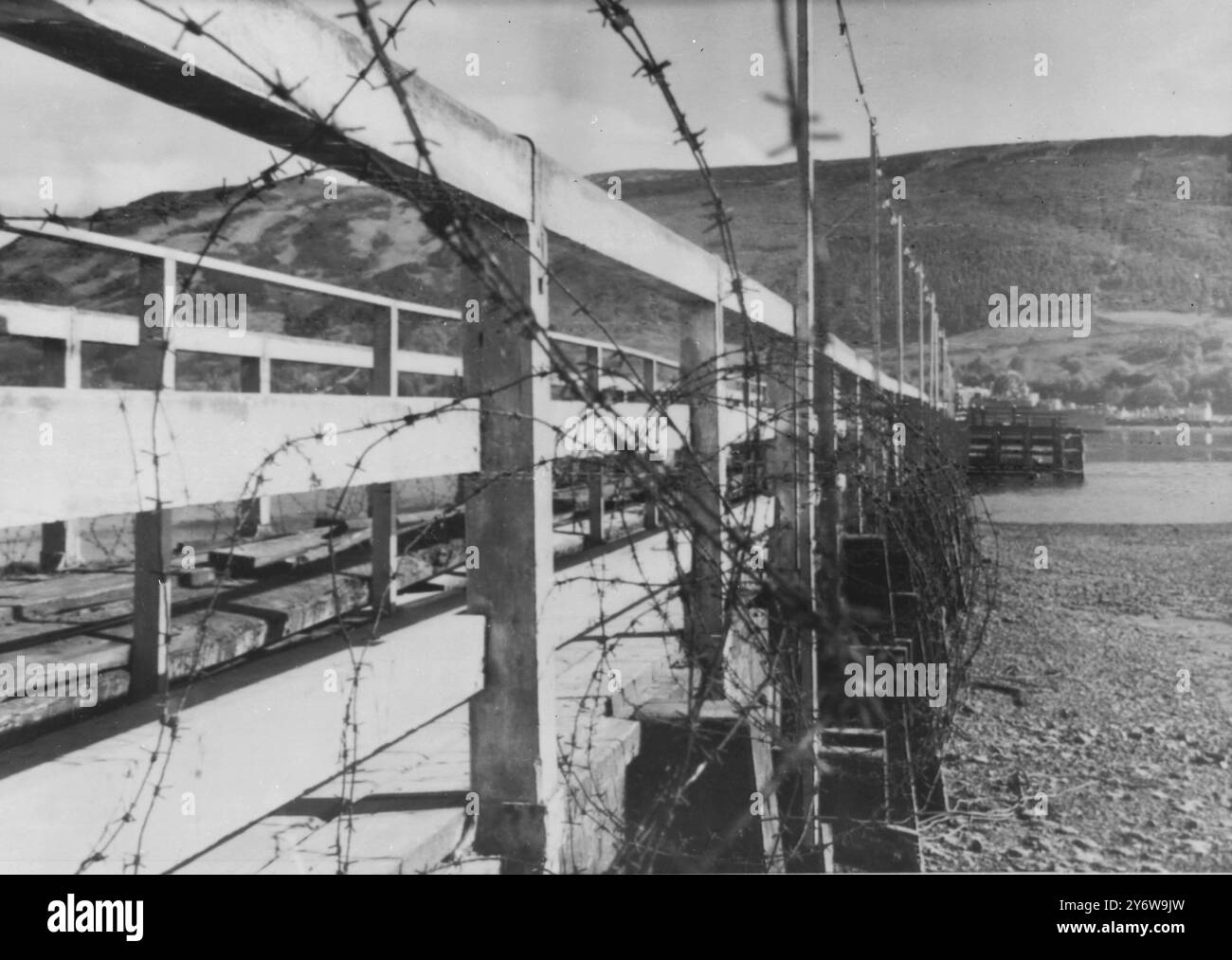 BARBED WIRE GUARD FOR SHIP PROTEUS IN SCOTLAND 20 MAY 1961 Stock Photo ...