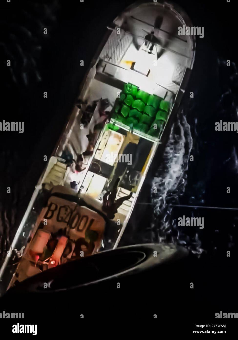 The U.S. Navy’s Helicopter Sea Combat Squadron 25 (HSC-25) lower an ...